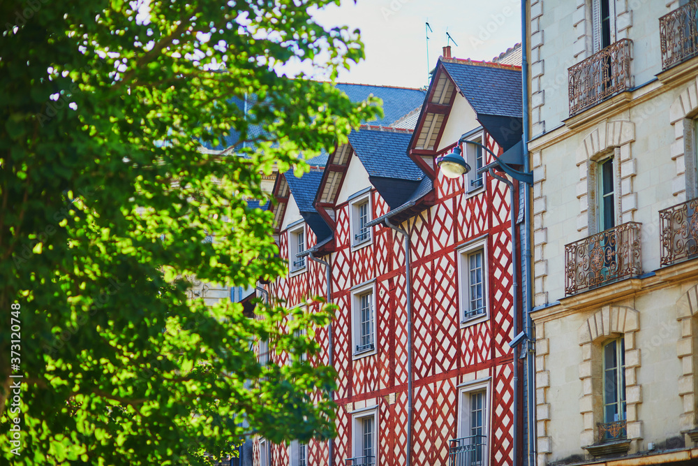 Poster Beautiful half-timbered buildings in medieval town of Rennes ...