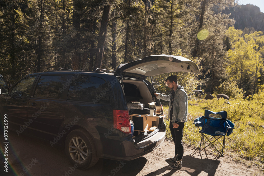 Vanlife young man Roadtripping and living out of his van Stock Photo ...