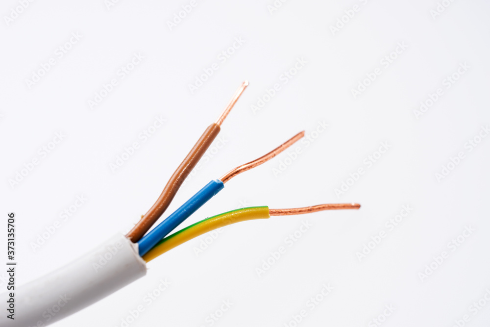 Flexible Three-wire electrical cable isolated on white background ...