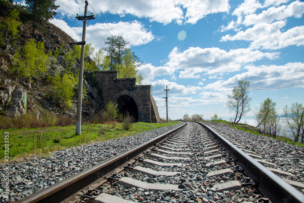 Old tunnel on Circum-Baikal Railway, lake Baikal. Baikal. View from one ...