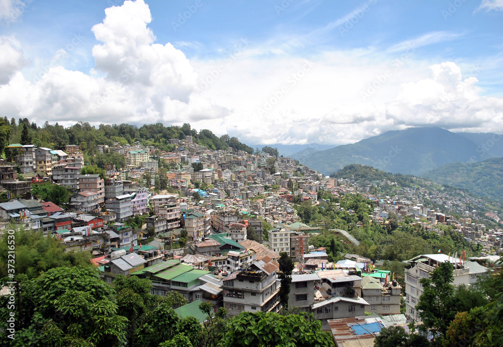 A view of Gangtok city, capital of Sikkim situated in the Himalayan ...