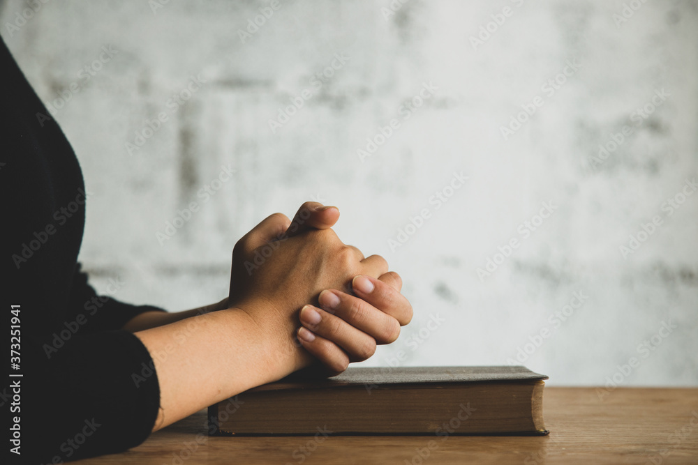 Praying Hands With Bible