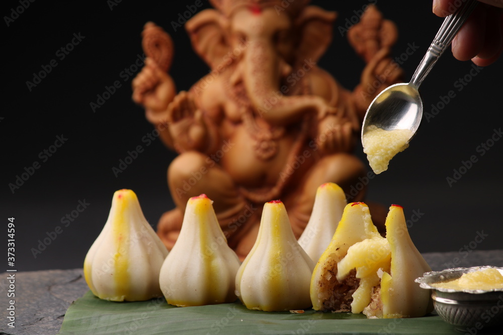 Modak- a traditional dish made on Ganpati festival in India. served ...