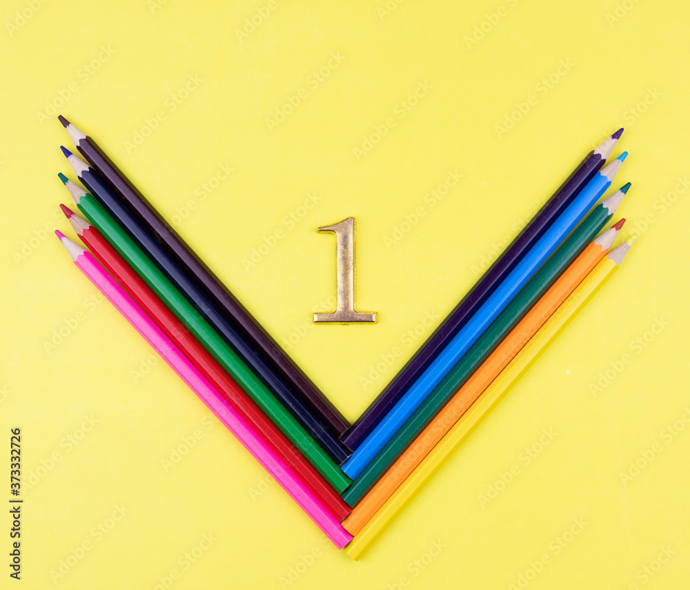 Foto de Colored pencils in the form of a check mark number one do Stock ...