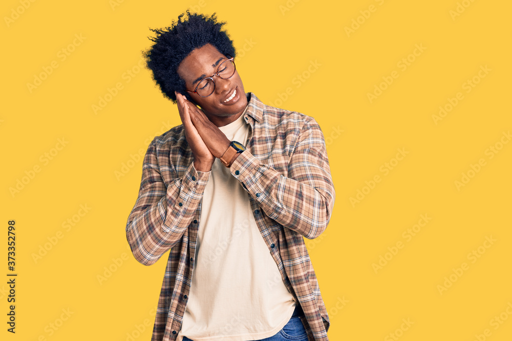 Handsome african american man with afro hair wearing casual clothes and ...
