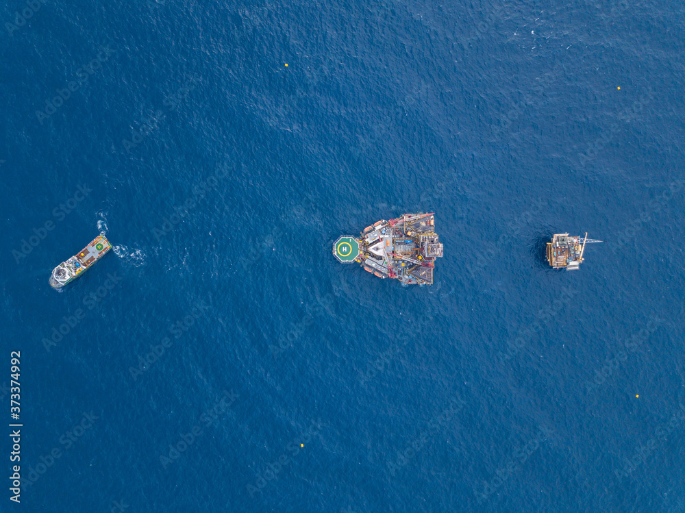 Aerial view from a drone of an offshore jack up rig at the offshore ...