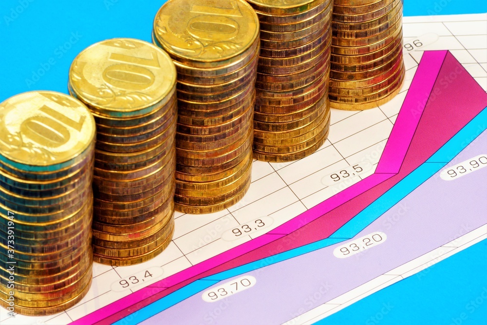 The financial schedule. Money coins and research chart. Planning long ...