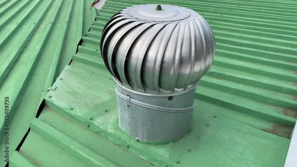 Roof turbine ventilation on a green roof controlling temperature ...