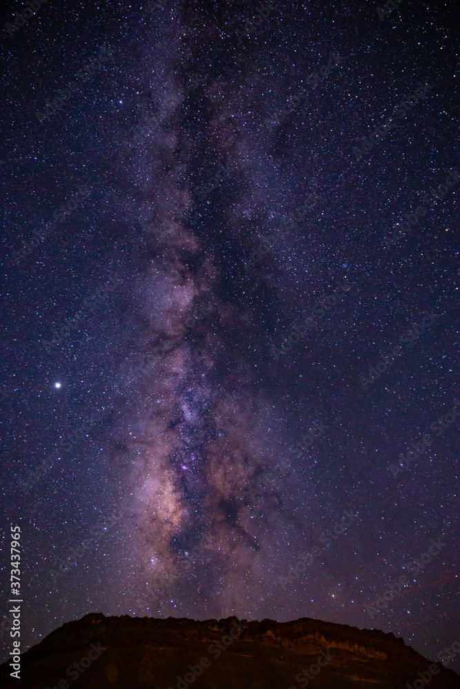Deep night sky with bright colorful milky way took with long exposure ...