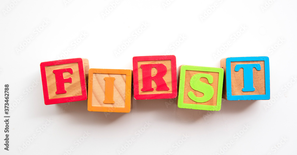 First word made from colourful wooden baby development blocks Stock ...