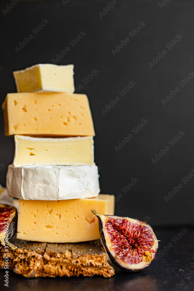 cheese assortment different types of hard and soft cheeses serving size ...