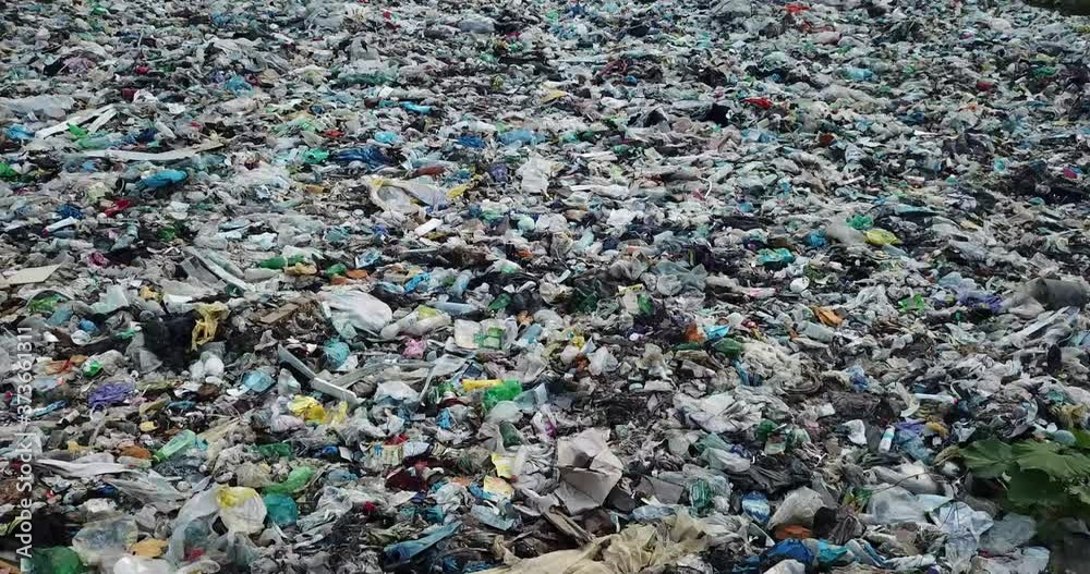 Garbage in the canals after the flood. Contaminated rivers with plastic ...