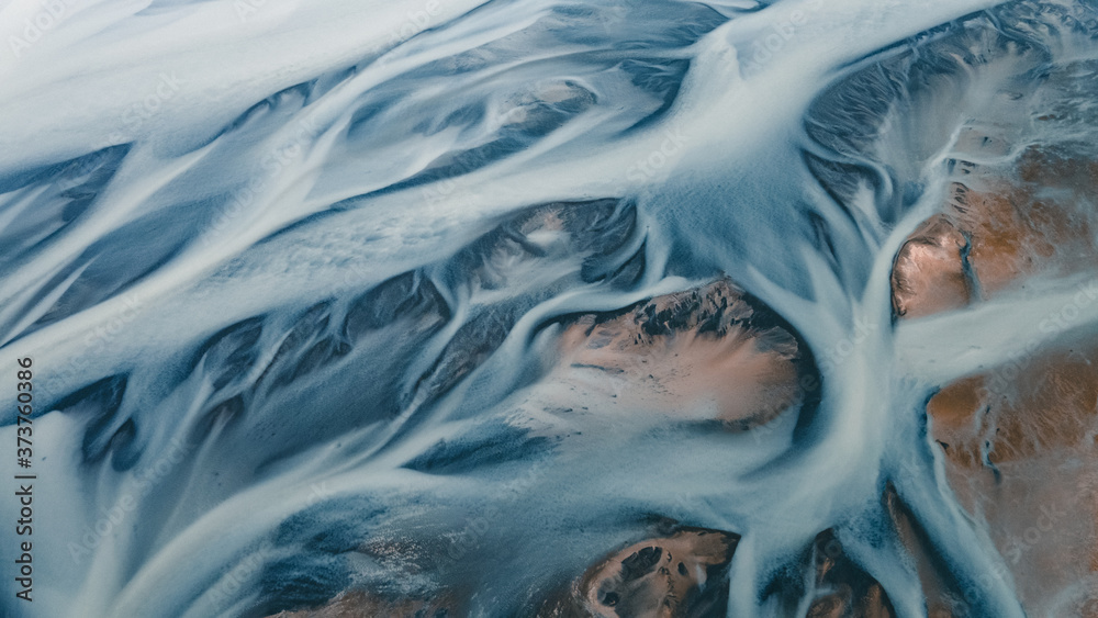 A glacial rivers from above. Aerial photograph of the river streams ...