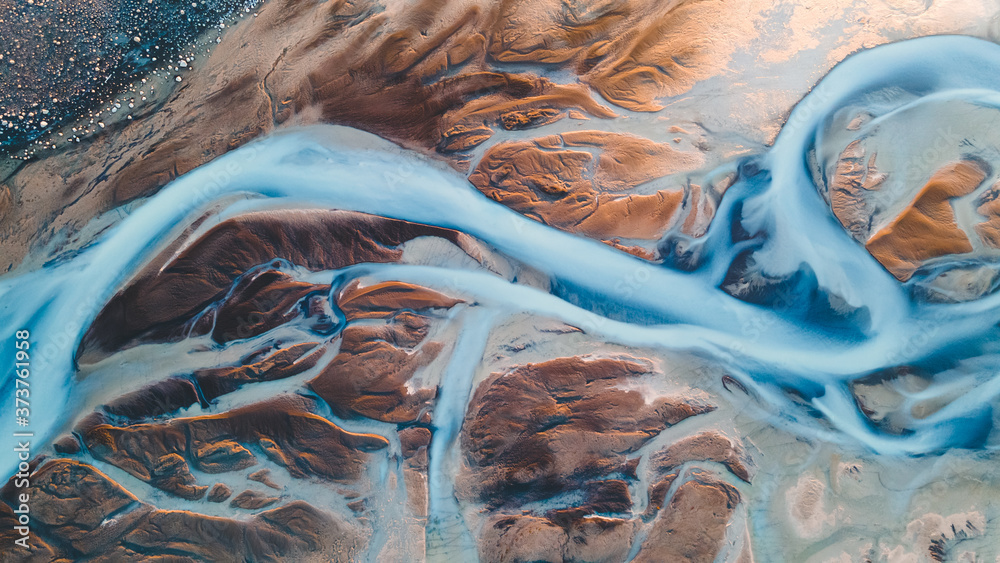A glacial rivers from above. Aerial photograph of the river streams ...