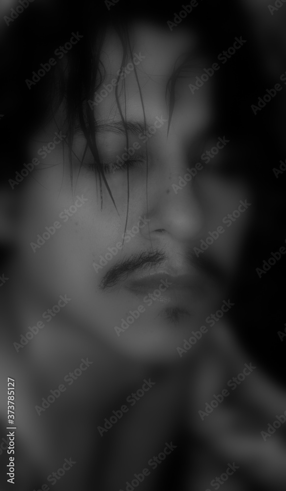 abstract black and white profile portrait. Silky unfocused male model ...