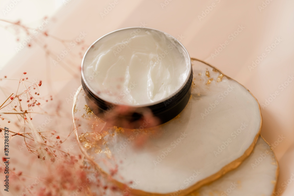 Cosmetic cream texture in a jar on pastel background Stock Photo ...