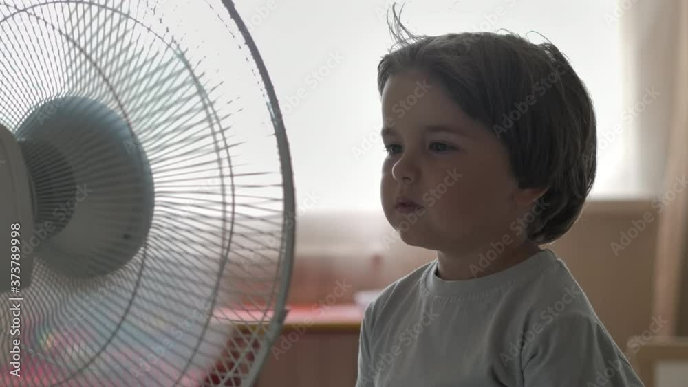 Video Stock Boy Standing in Front of FBoy Standing in Front of Fan ...