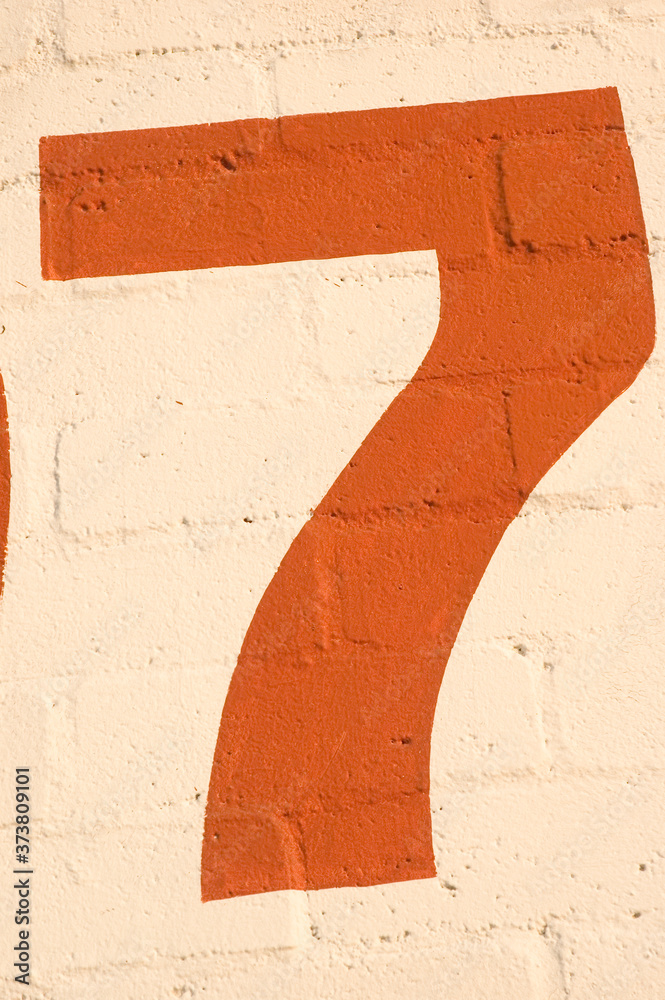 Old used faded worn torn and tattered photo of individual numbers 0 to ...