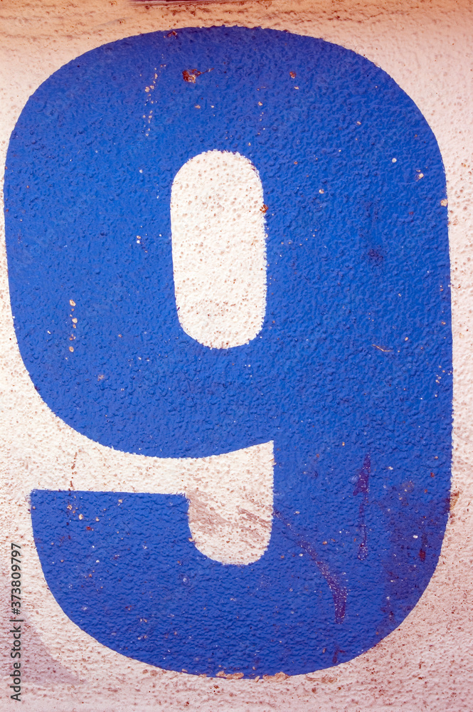 Old used faded worn torn and tattered photo of individual numbers 0 to ...