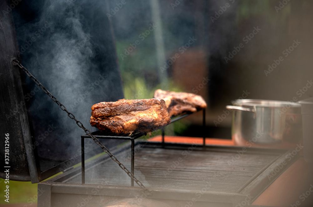 Thai chef cooks beef steak in Japanese teppanyaki style. Grilled ...