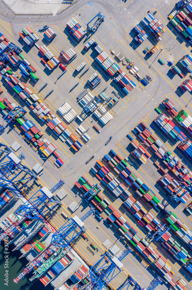 Container ship loading at port with crane, container ship carrying ...