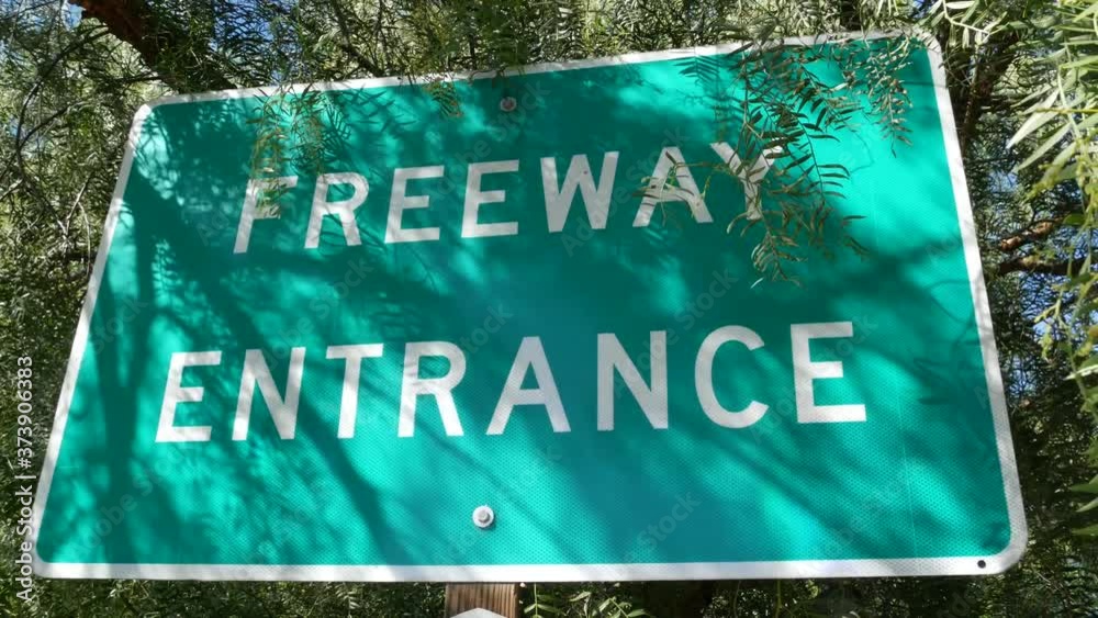 Freeway entrance sign on interchange crossraod in San Diego county ...