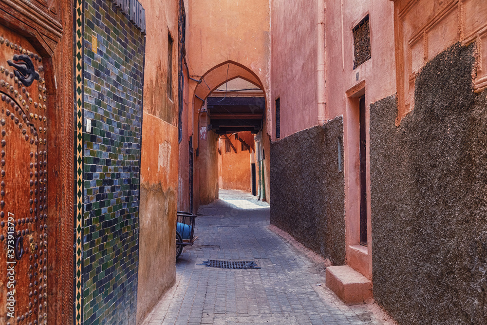 Foto de Colorful narrow streets of the Meknes medina. Meknes is one of ...