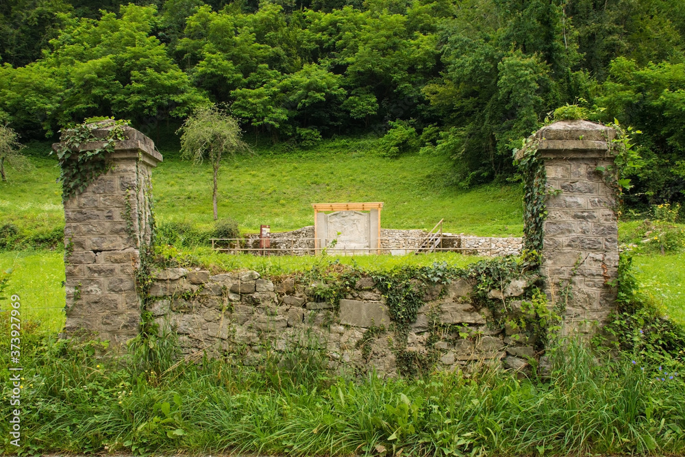 The remains of the wall at the former world war one cemetery in Kamno ...