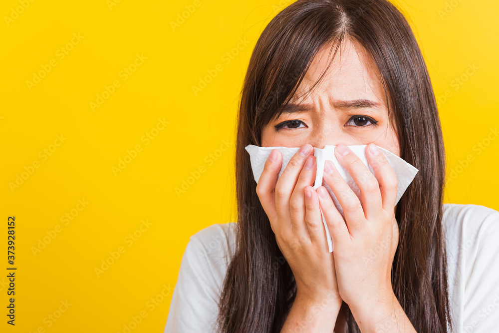 Portrait of Asian beautiful young woman sad she crying wipe the mucus ...