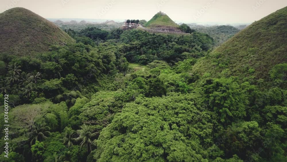 Chocolate Hills sightseeing platform aerial zoom view: mountain with ...