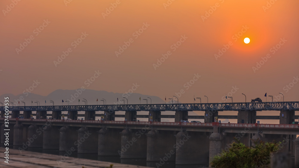 Historic Prakasam barrage in twilight, at Vijayawada, India Stock Photo ...