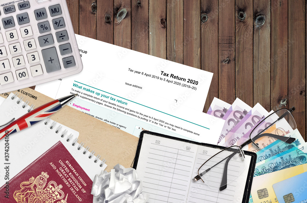 English form sa100 Tax return by HM revenue and customs lies on table ...
