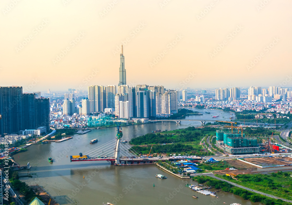 Panorama High view Saigon skyline when the sun shines down urban with ...