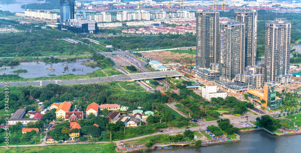 Panorama High view Saigon skyline when the sun shines down urban with ...