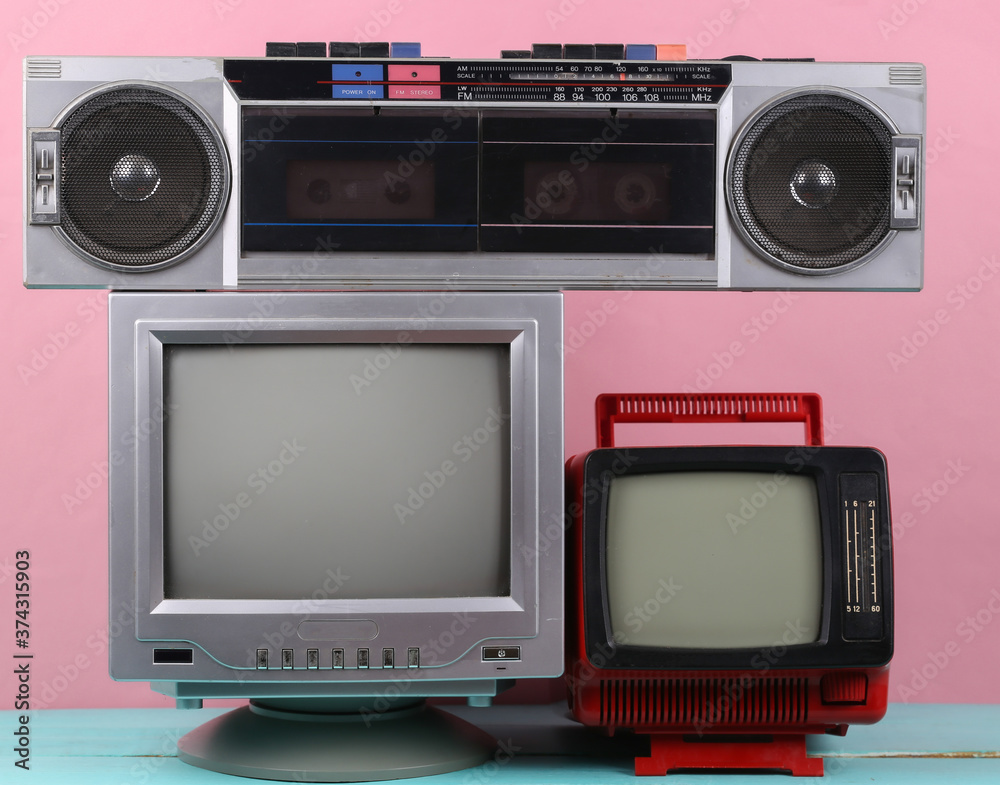 80s Retro outdated portable stereo radio cassette recorder, tvs set on ...