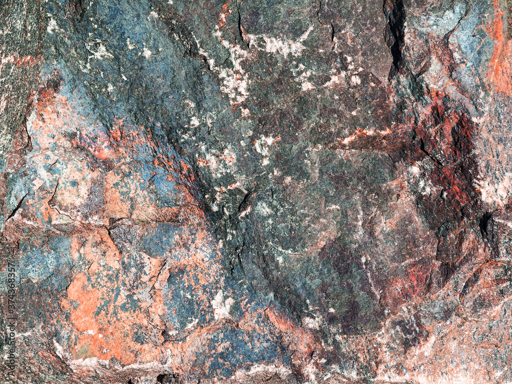 Stone background of mottled granite igneous rock used in construction ...