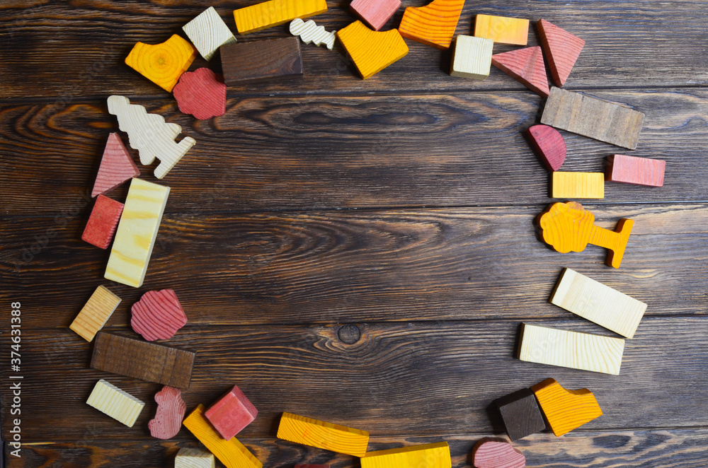 Children's wooden construction kit in the form of geometric shapes with ...