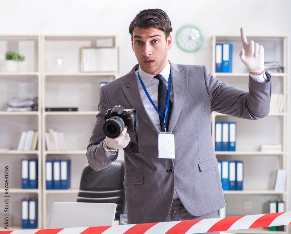 Forensics investigator at the scene of office crime Stock Photo | Adobe ...