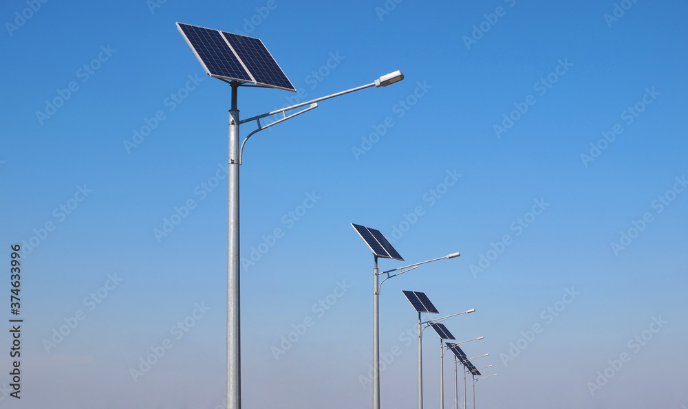 Street lighting pole with photovoltaic panel and LED lamp lights Stock ...