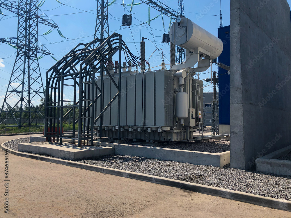 Power plant and power lines. Electricity is essential for all areas of ...