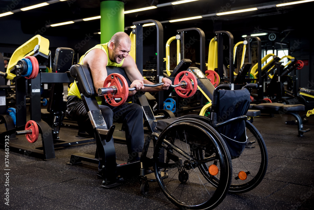 Disabled man training in the gym of rehabilitation center Stock Photo ...