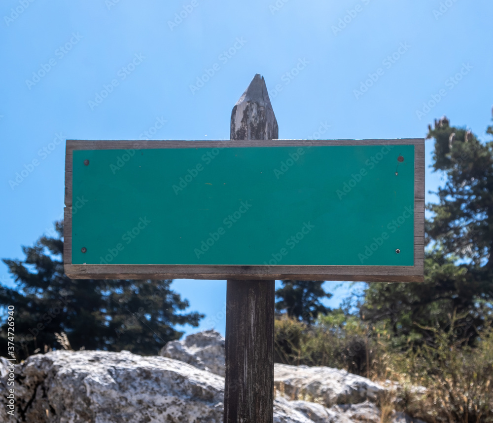 Blank sign mockup, mountain forest trees background, copy space Stock ...