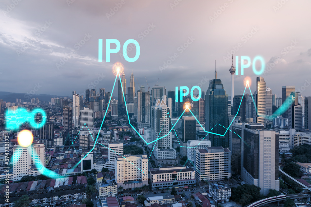 Hologram of IPO glowing icon, sunset panoramic city view of Kuala ...