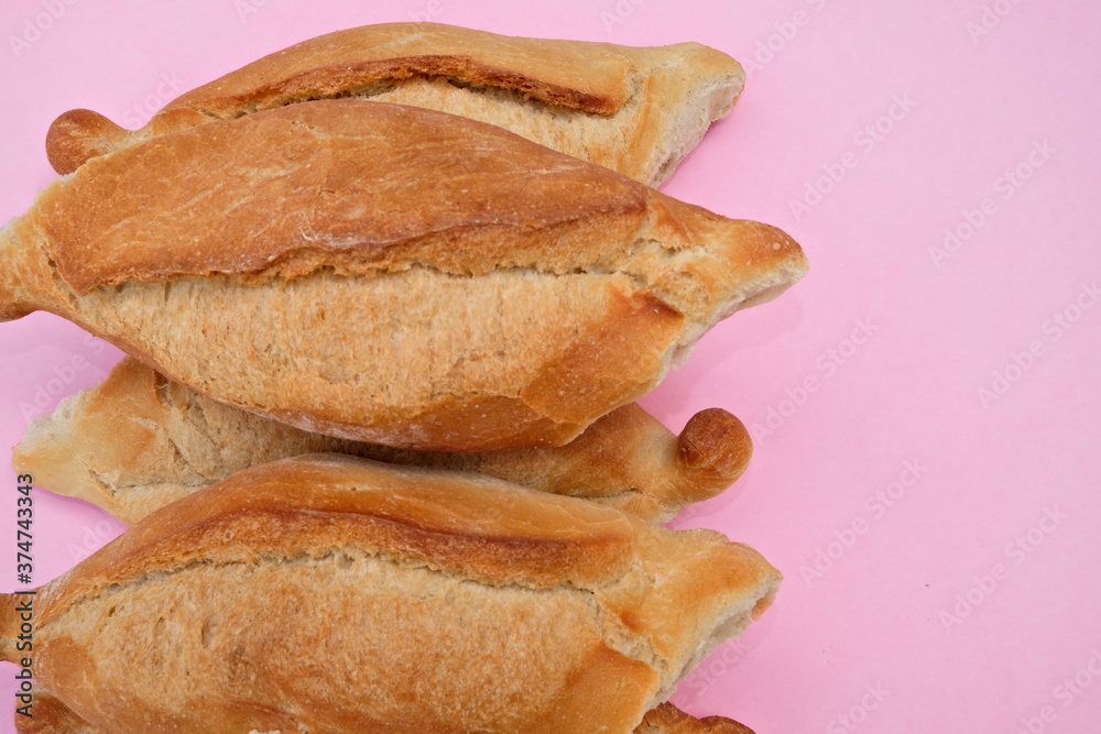 Pile of loaves of Mexican white bread, Bolillo Fleima, traditional ...