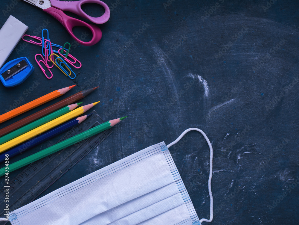 School supplies and COVID 19 prevention items. Double border on a ...