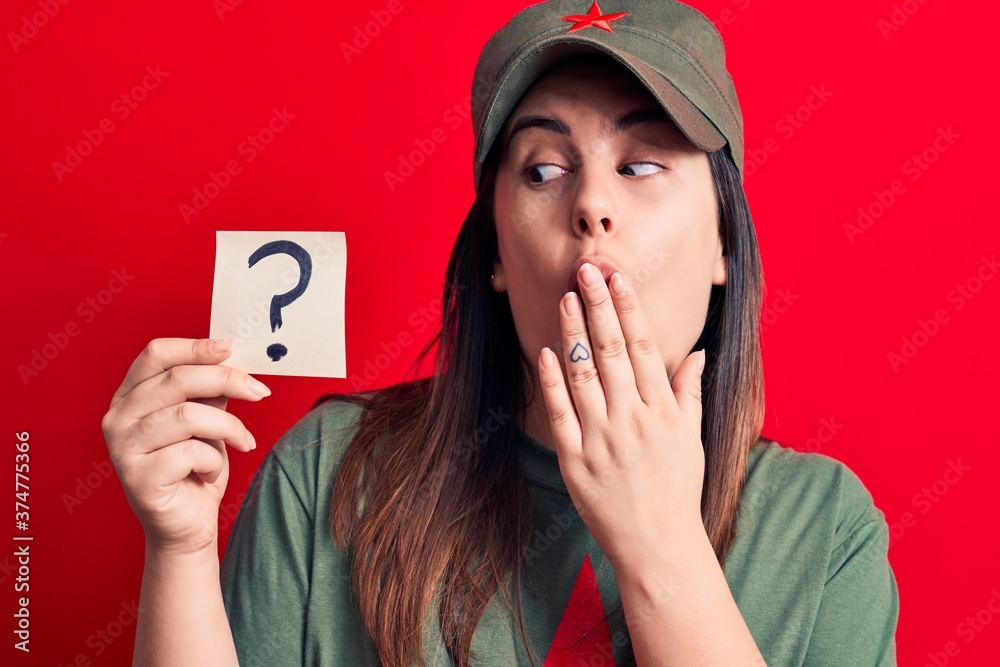 Beautiful woman wearing cap with red star communist symbol holding ...