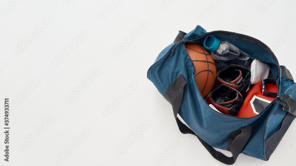 Basketball equipment and accessories. Top view of a sports bag with ...