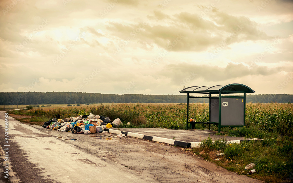 trash dump on rural bus stop Stock Photo | Adobe Stock
