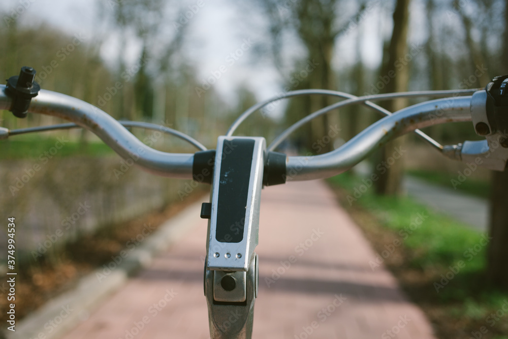 A steering wheel of a dutch bicycle. Stock Photo | Adobe Stock