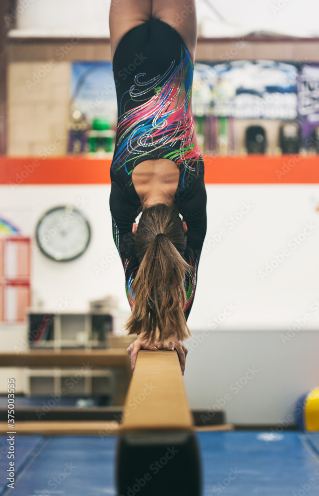 Gymnastics: Girl Does A Handstand On The Balance Beam Stock Photo ...
